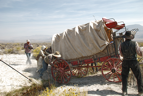 Boys-getting-wagon-out-of-ditch - Little Light Studios